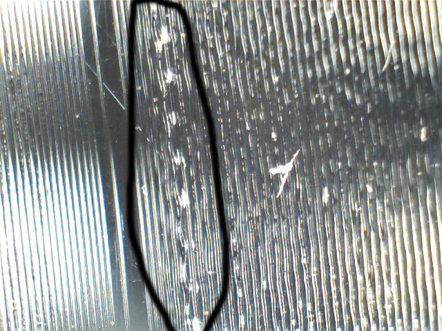 Mystery marks on vinyl record, microscope images and sound bytes here ...